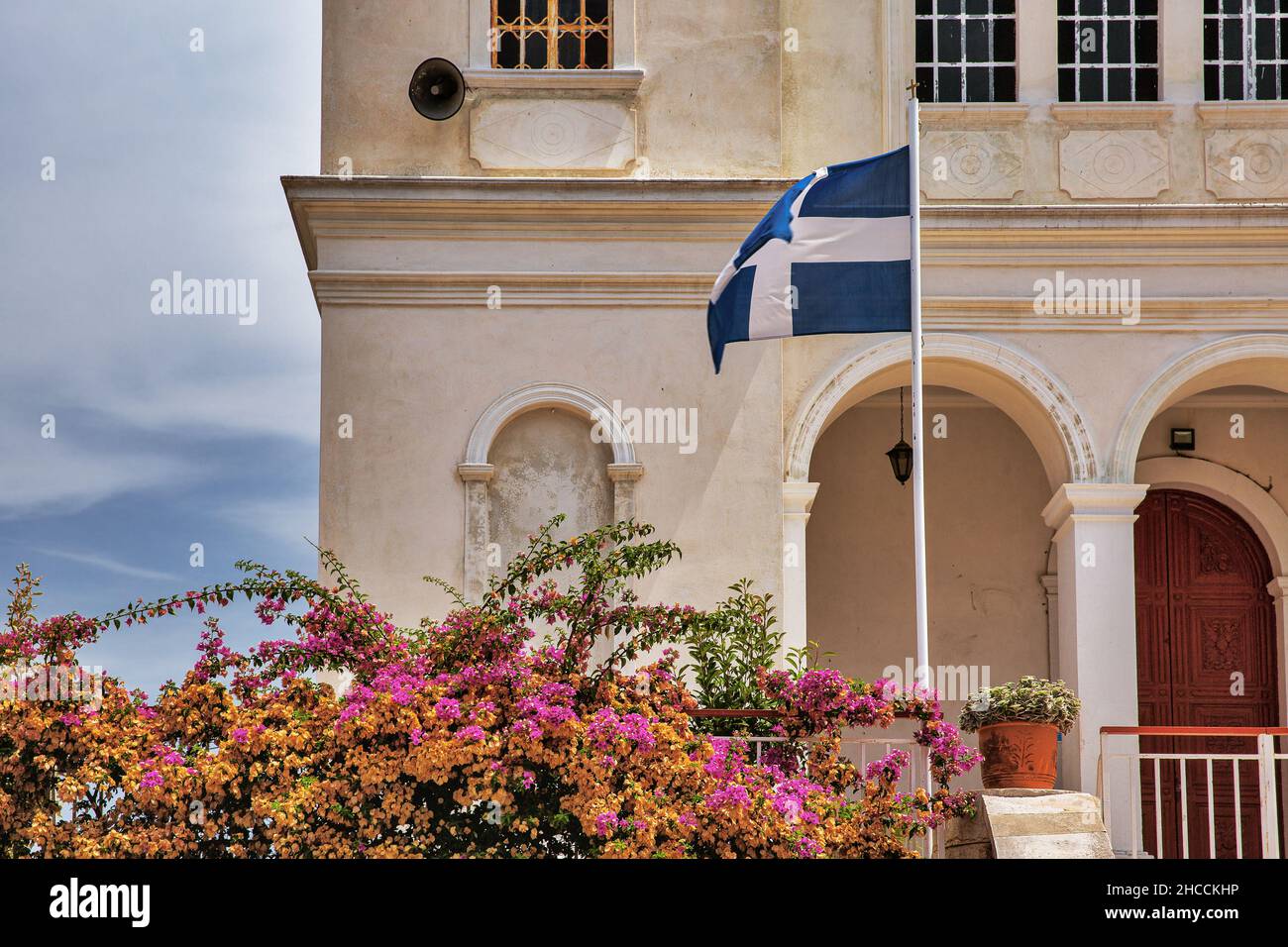 Greek National flag in front of Holy Temple of Agios Arsenios in ...