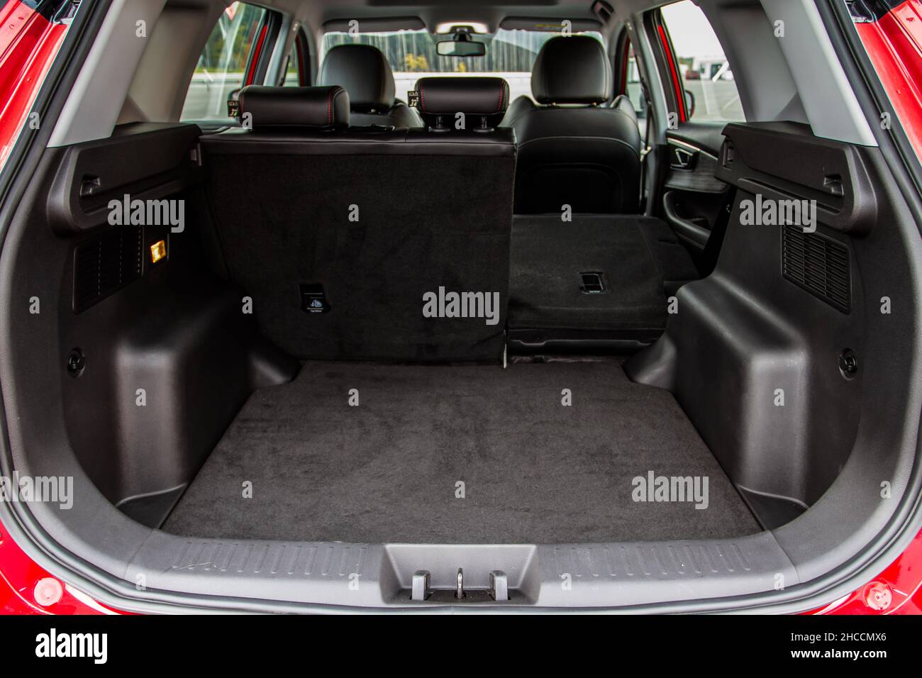 Huge, clean and empty car trunk in interior of compact suv. Rear view ...