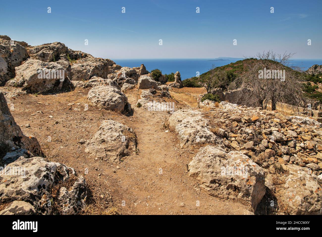Ancient stone ruins of cliff fortress Angelocastro, Corfu island ...