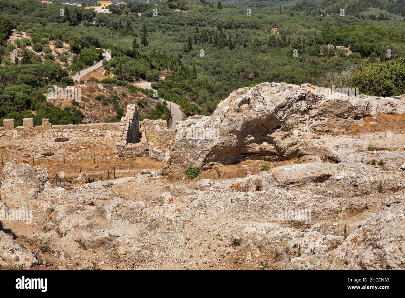 Ancient stone ruins of cliff fortress Angelocastro, Corfu island ...