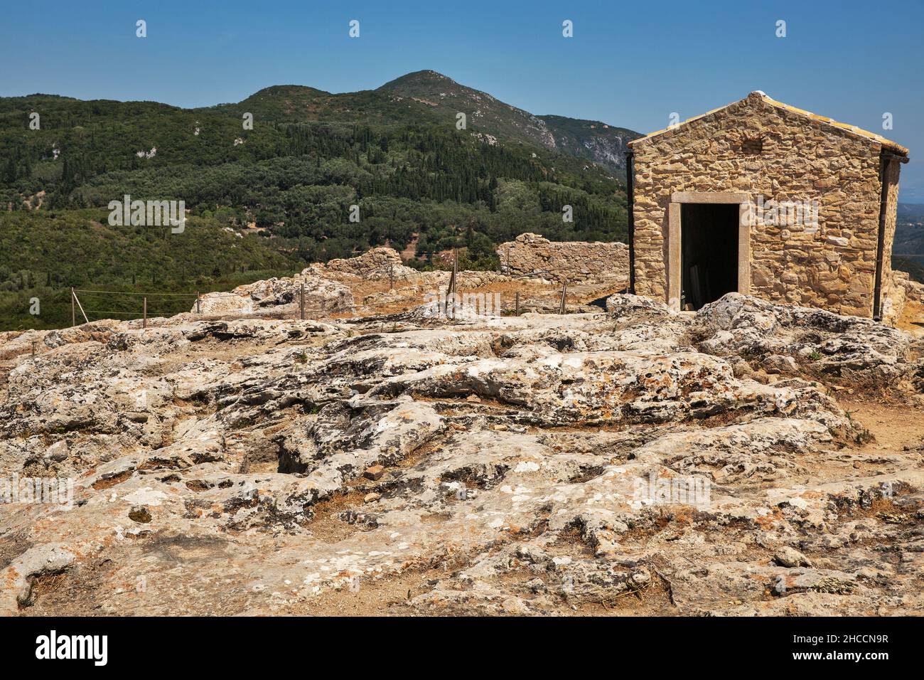 Ancient stone ruins of cliff fortress Angelocastro, Corfu island ...