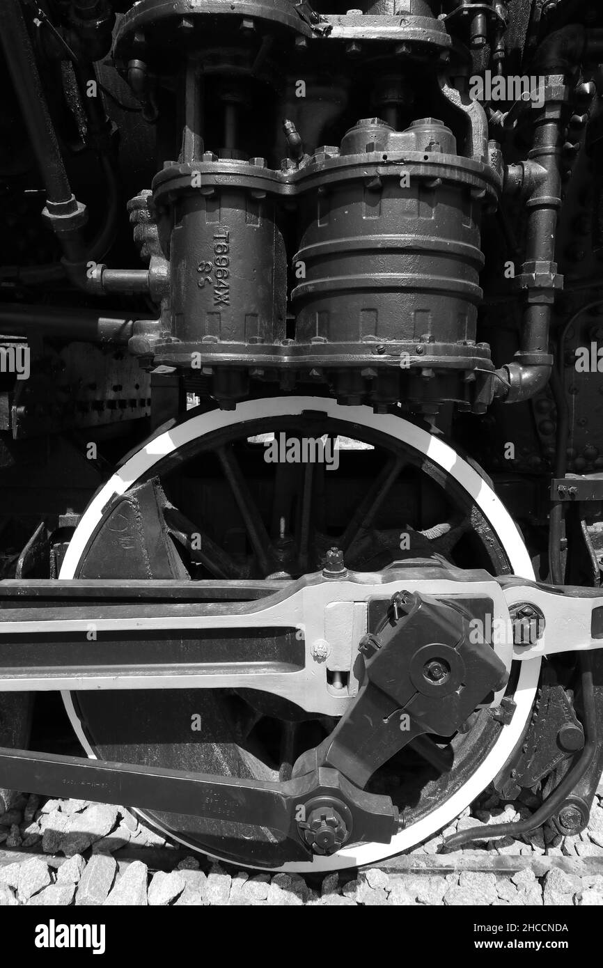 Grayscale shot of an old steam locomotive wheel Stock Photo - Alamy