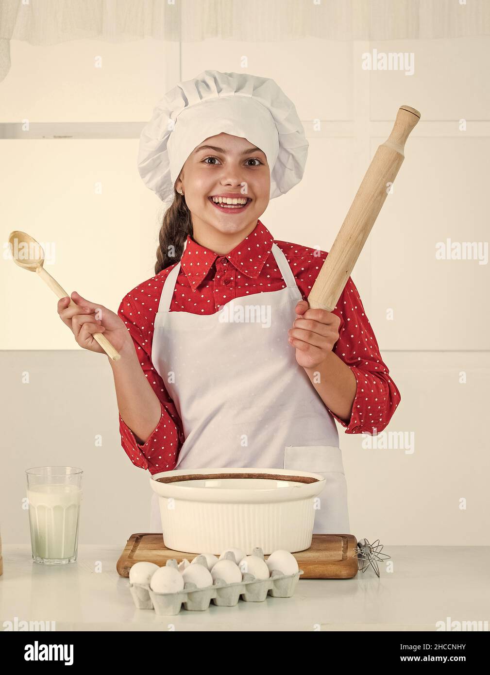 homemade pastry. happy childhood. happy teen girl cooking dough. kid in ...