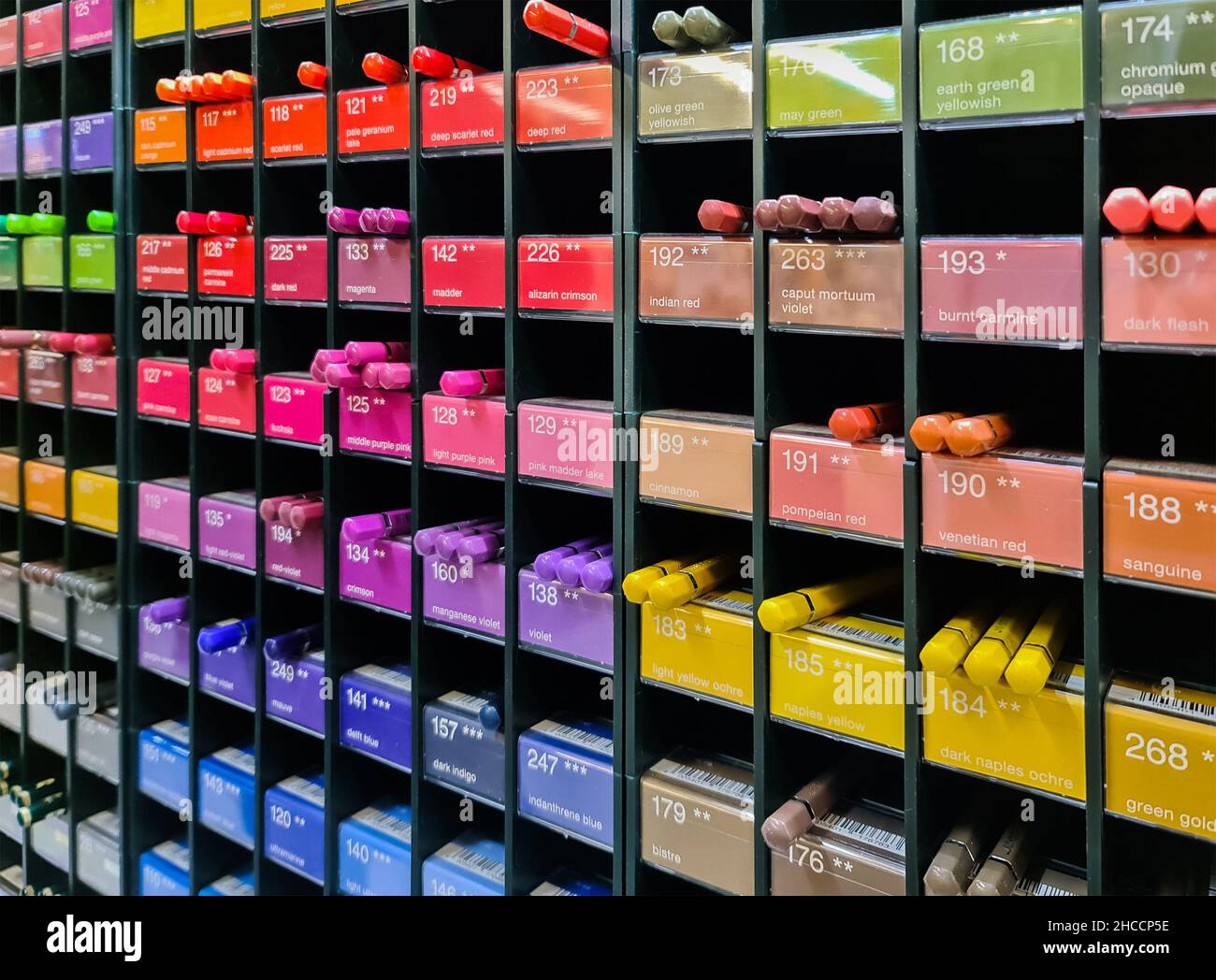 Large retail display of crayons of all rainbow colors in a craft store ...