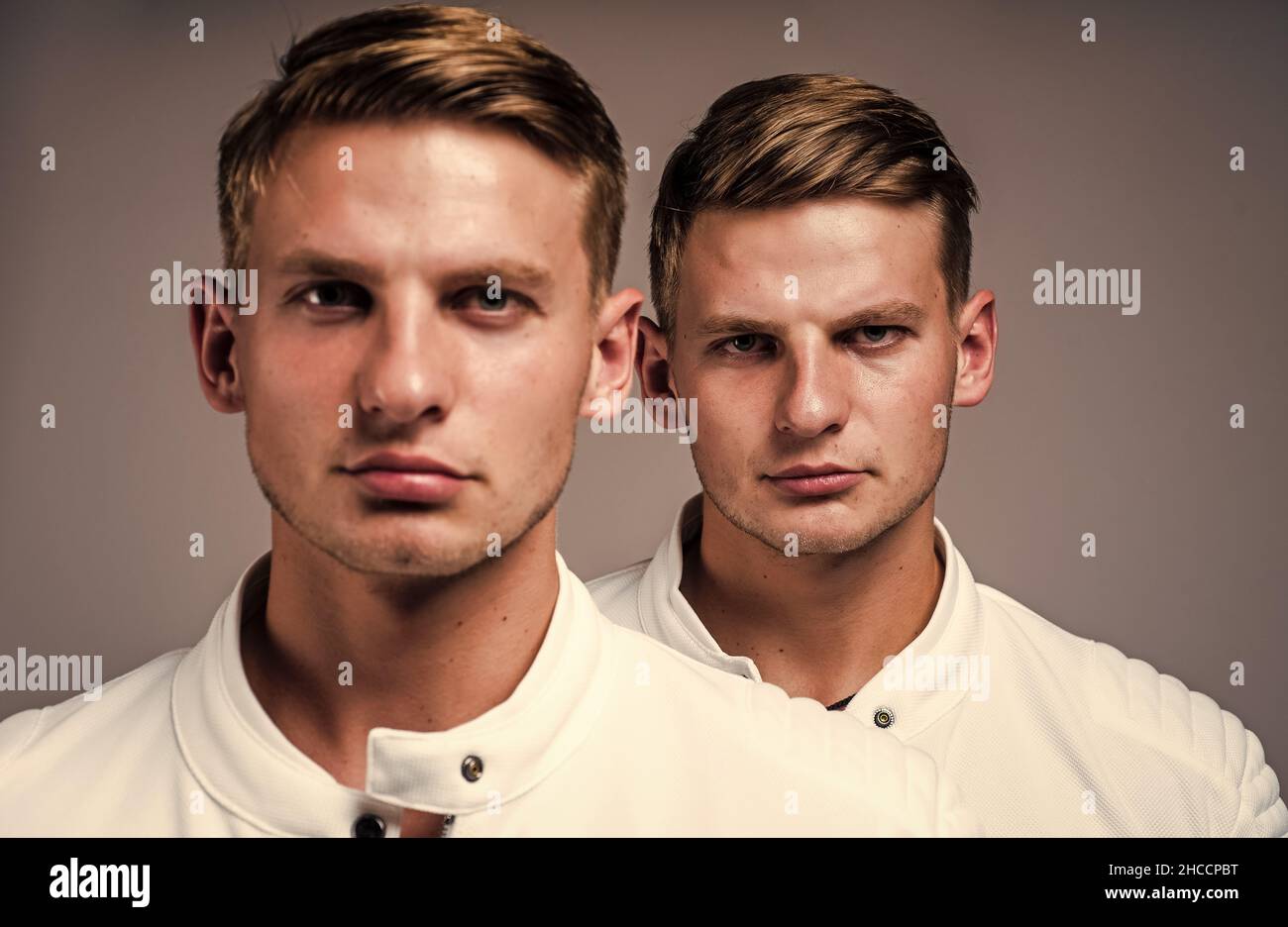 young twin brothers with similar appearance, twins Stock Photo - Alamy