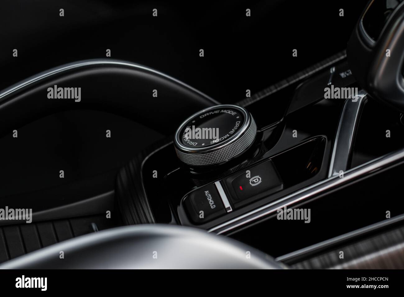 Modern car drive mode selector. Suspension and wheel drive control ...