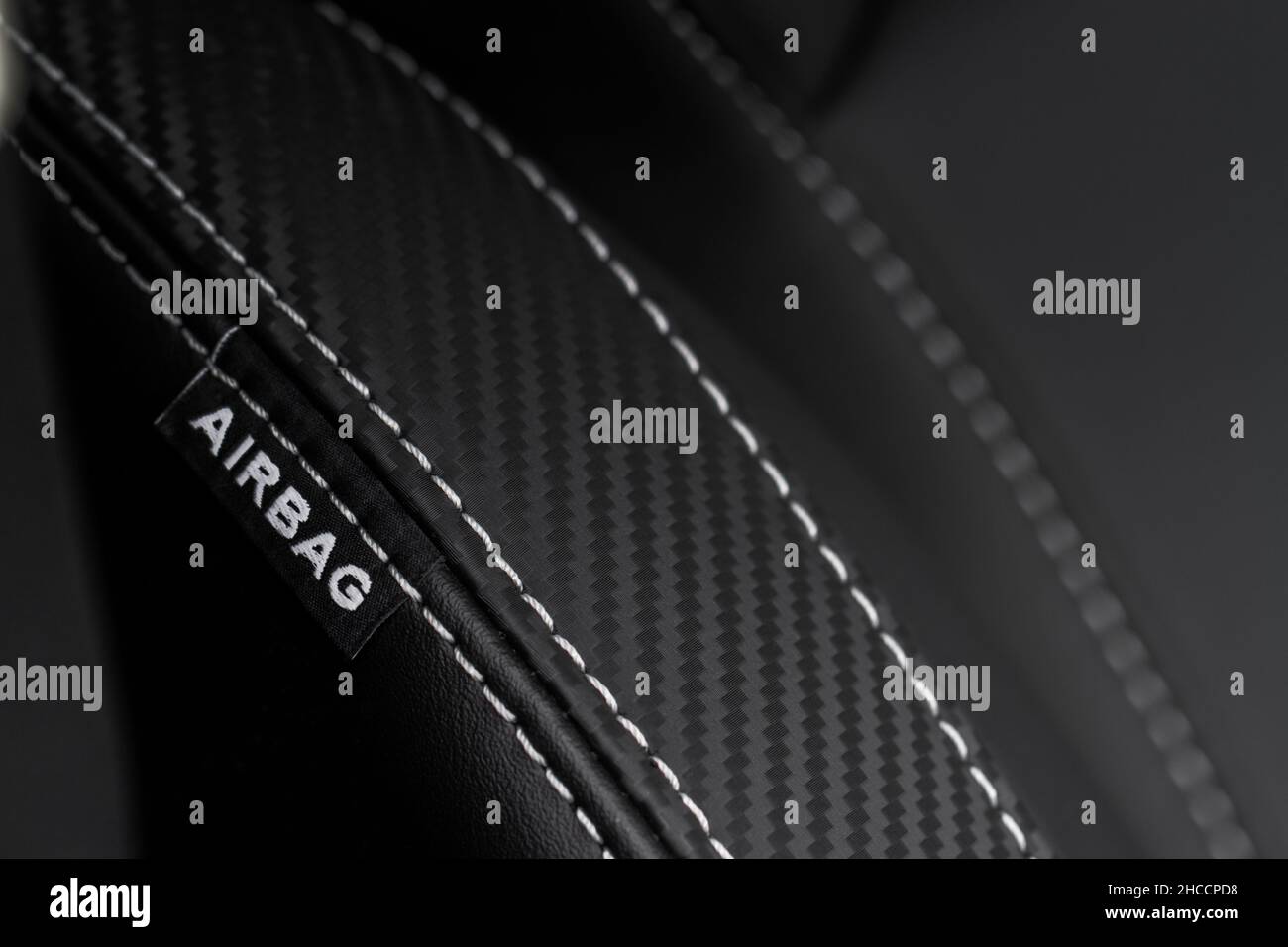 Close up view of airbag label on the side of a car seat. Airbag safety ...