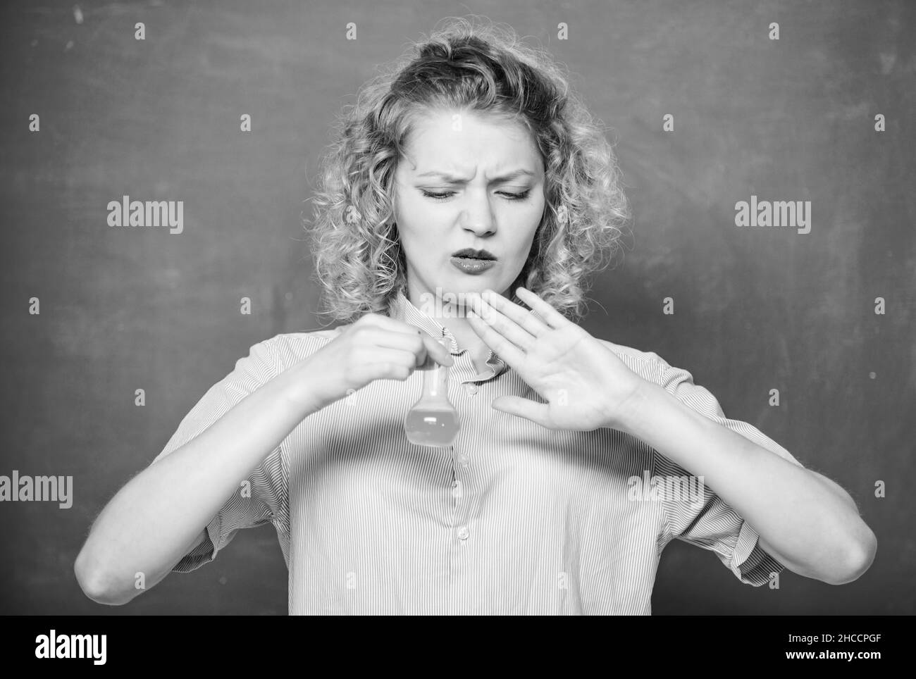 High school classes. College student performing chemical reaction ...