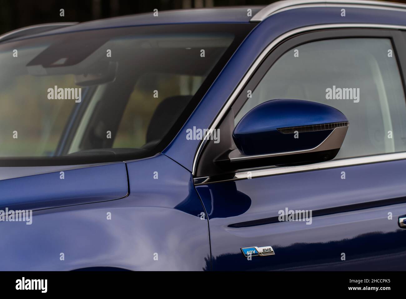 Close up front view of car side mirror. Front rear view mirror on the ...