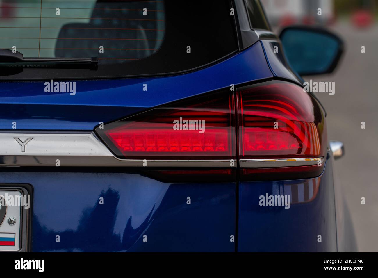 Modern rear light of a car. Brake light and arrow of large suv. Rear ...