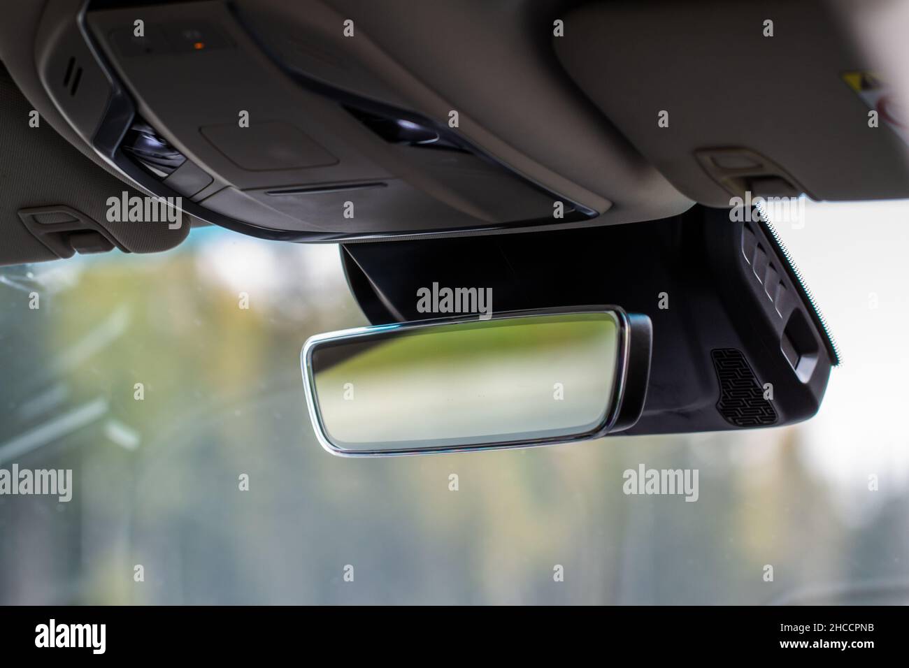 The rear view mirror inside the car Stock Photo - Alamy