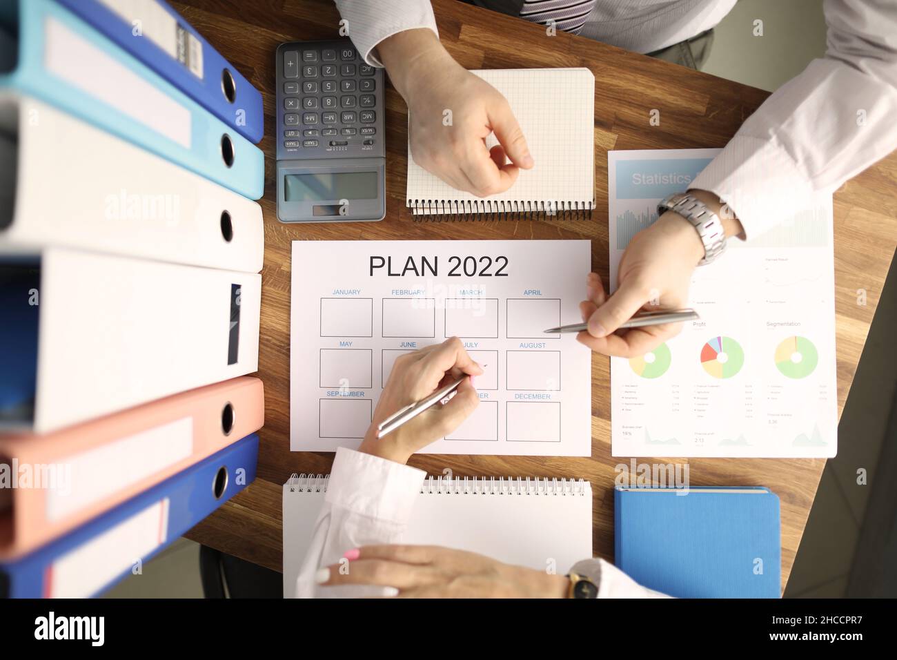 Business man and woman making plan for 2022 closeup top view Stock ...