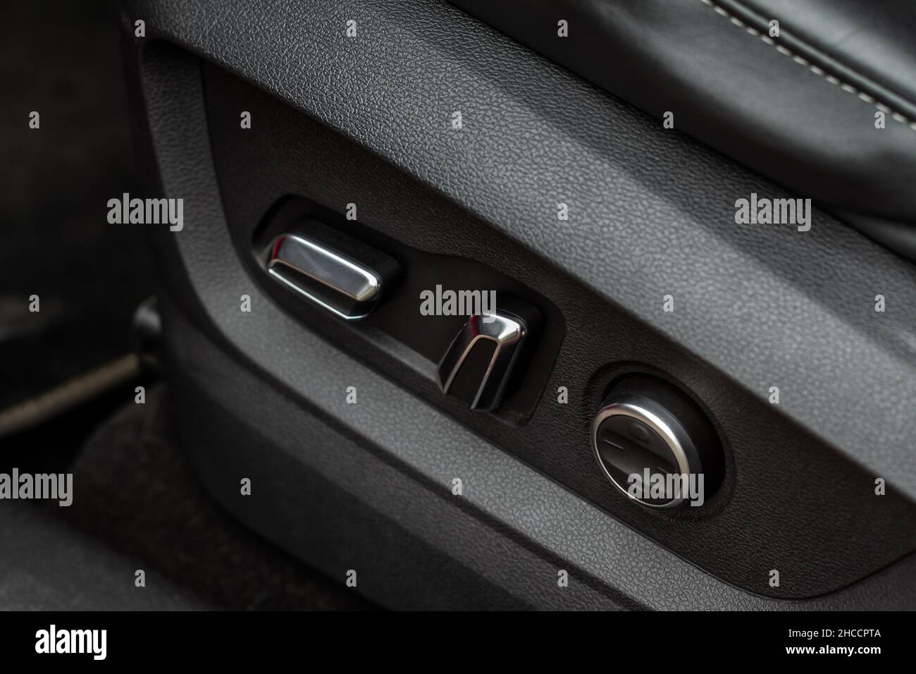 Electric car seat adjustment control panel close up view. Adjustable ...