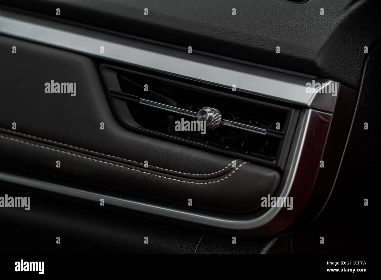 Car air conditioning close up view. The air conditioner flow inside the ...