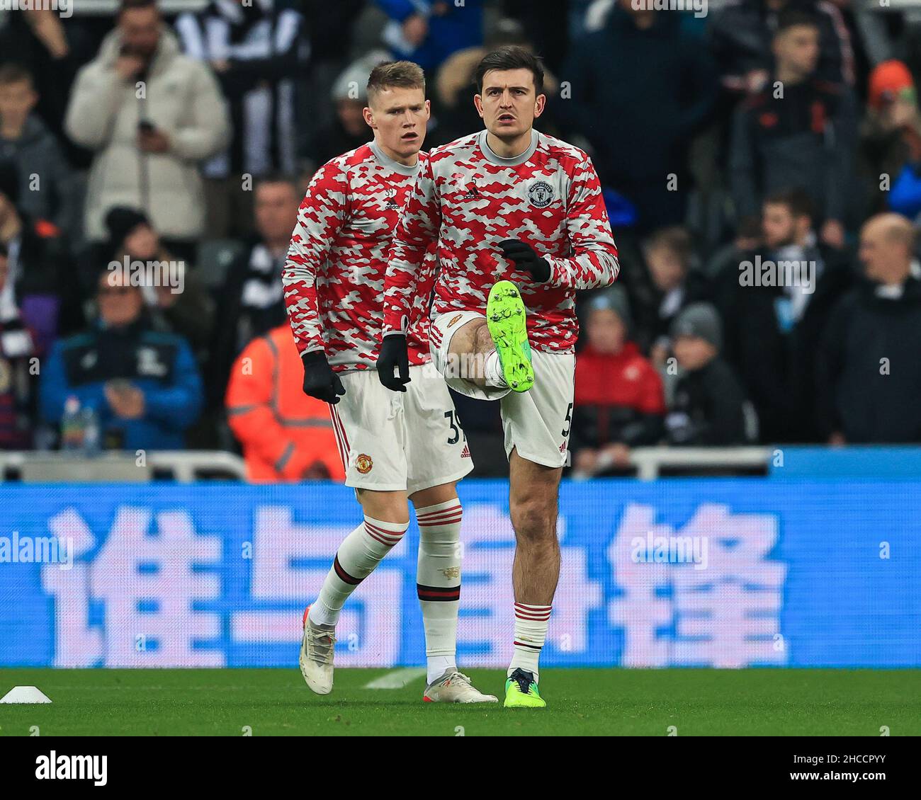 Harry Maguire #5 of Manchester United stretches during the pre-game ...