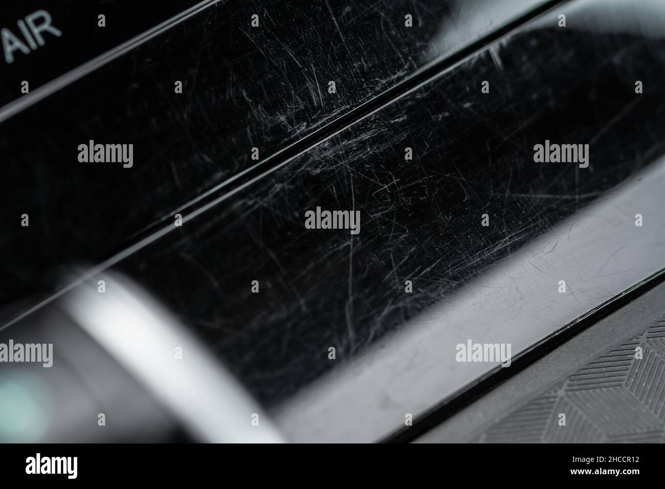Scratched plastic details. Textured black plastic Stock Photo - Alamy