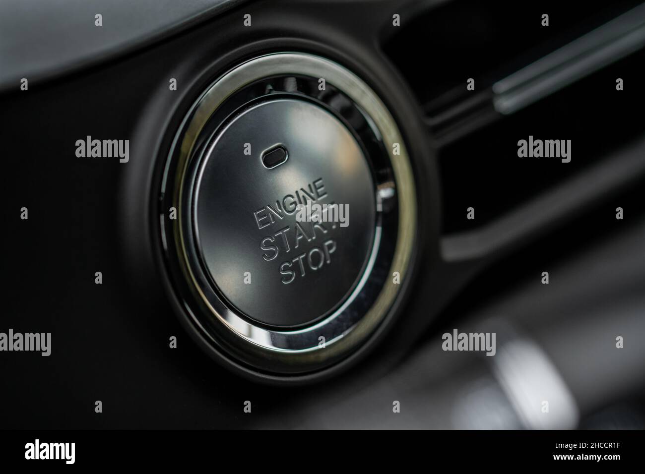 Engine start button. Close up engine car start stop button. Modern car ...