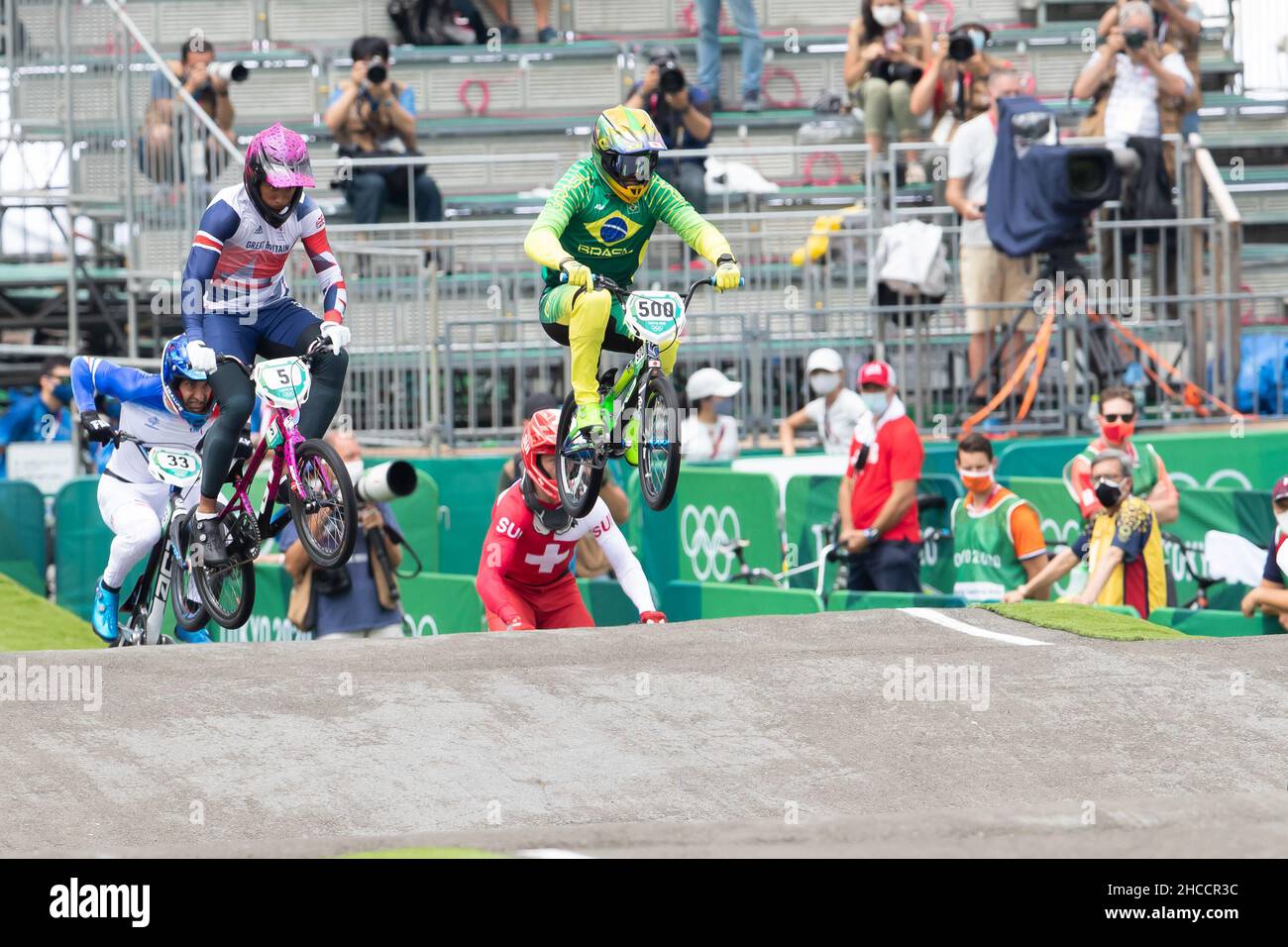 July 30, 2021: Renato Rezende (500) of Brazil BMX takes a jump pursued ...