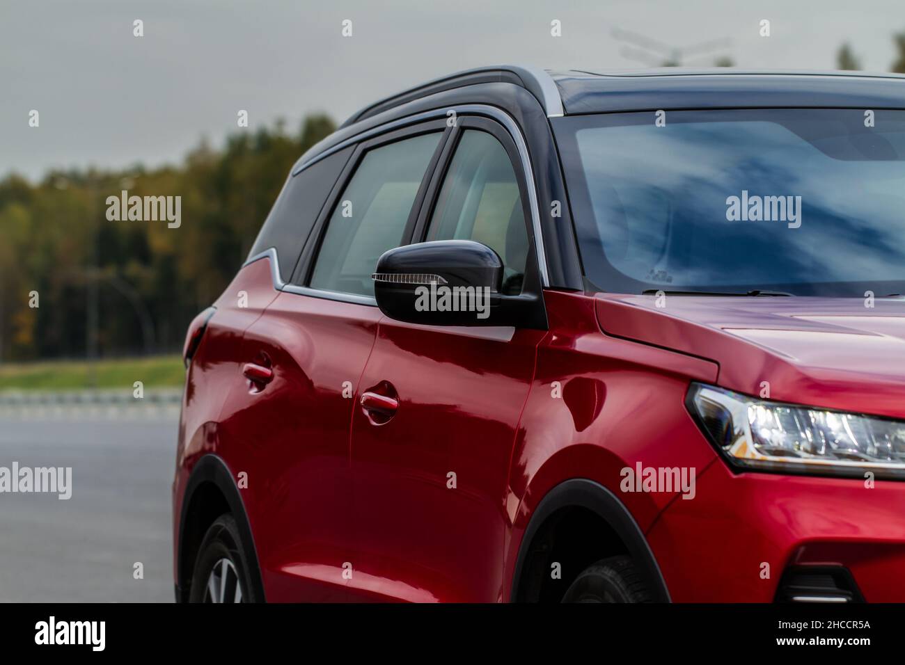 Close up front view of car side mirror. Front rear view mirror on the ...