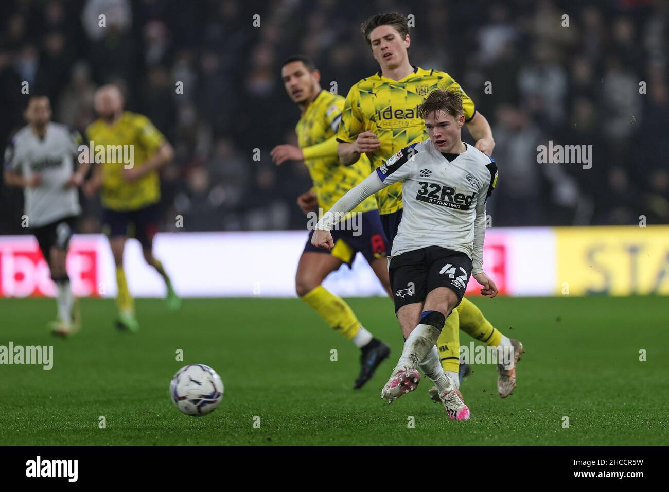 Derby, UK. 27th Dec, 2021. Liam Thompson #42 of Derby County crosses ...