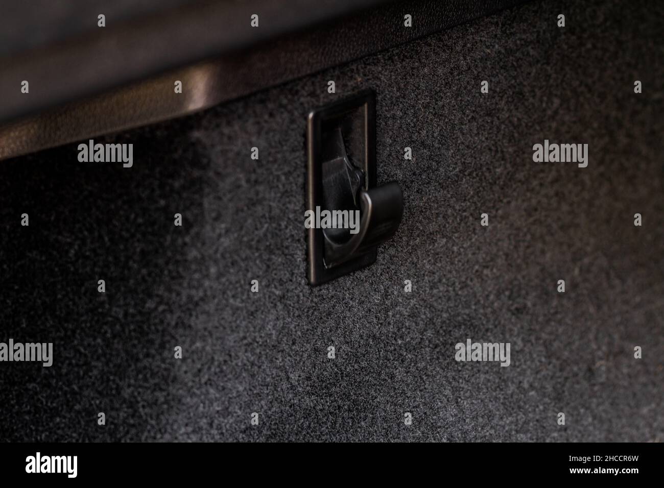 Opened hook for packages in the trunk of the car. Modern car trunk ...