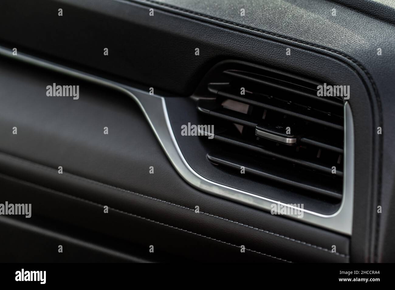 Car air conditioning close up view. The air conditioner flow inside the ...