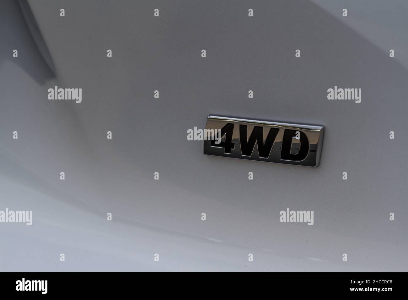 4WD emblem on modern SUV car detail close up view. Four Wheel Drive ...