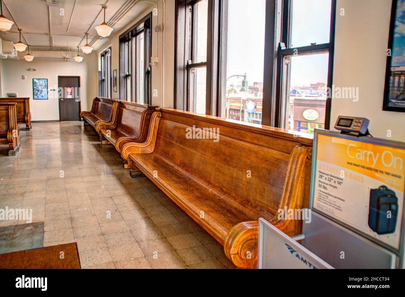 passenger benches in train station lobby Stock Photo - Alamy