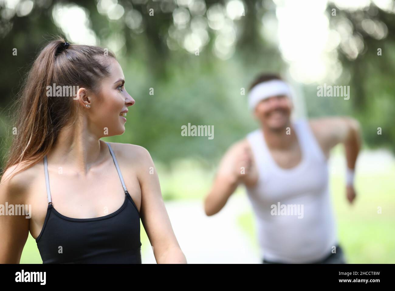 Man catching up woman hi-res stock photography and images - Alamy