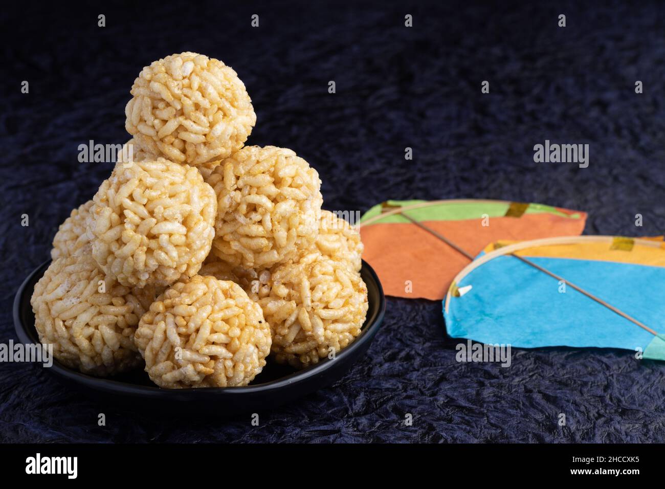 Winter delicacy Indian traditional sweets or mithai with kites for ...