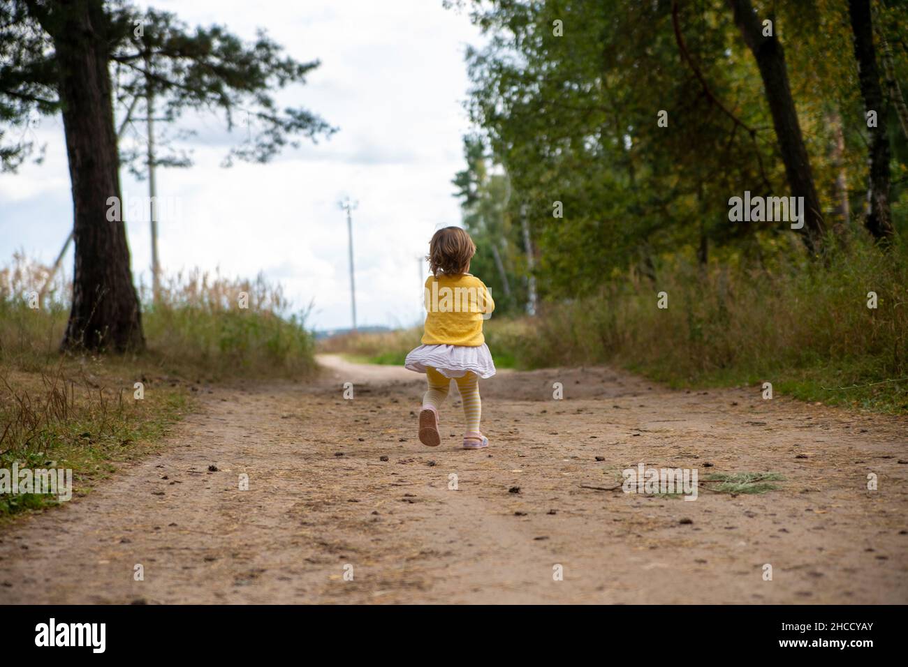 Child road run hi-res stock photography and images - Alamy