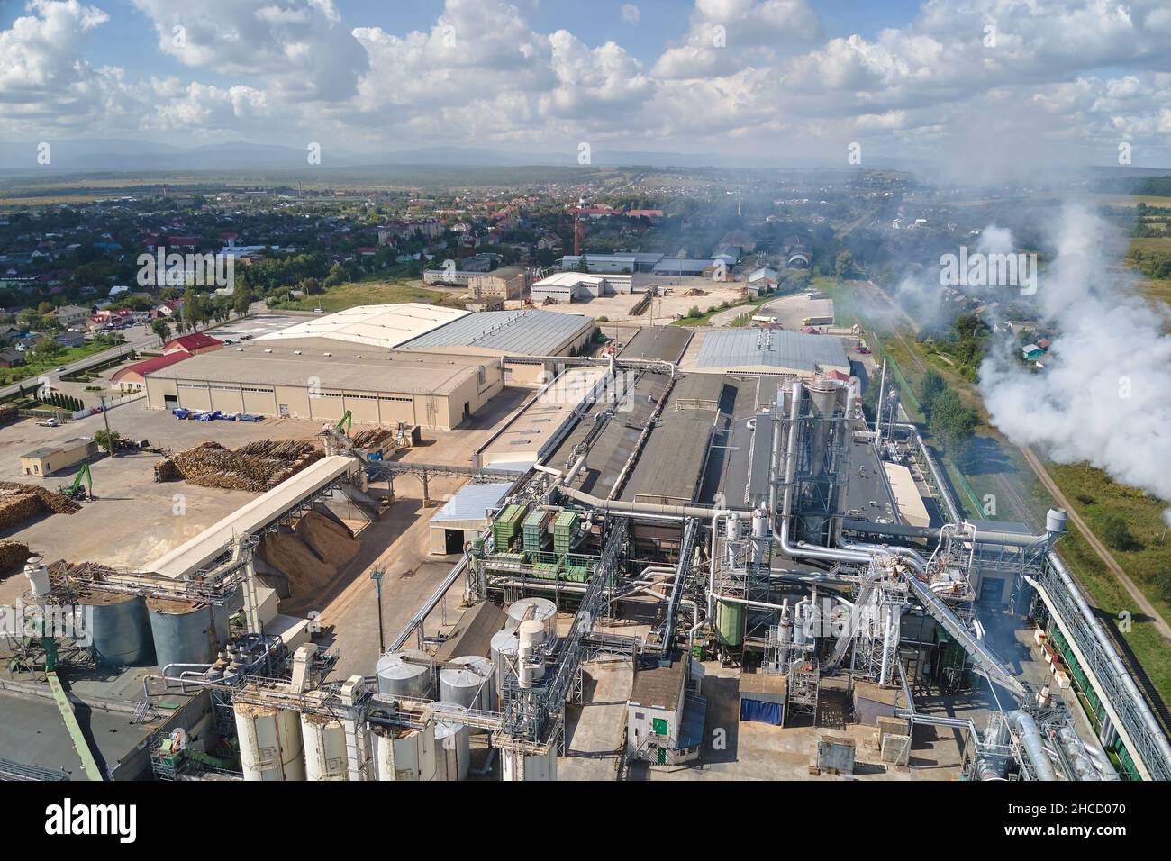Aerial view of oil and gas refining petrochemical factory with high ...