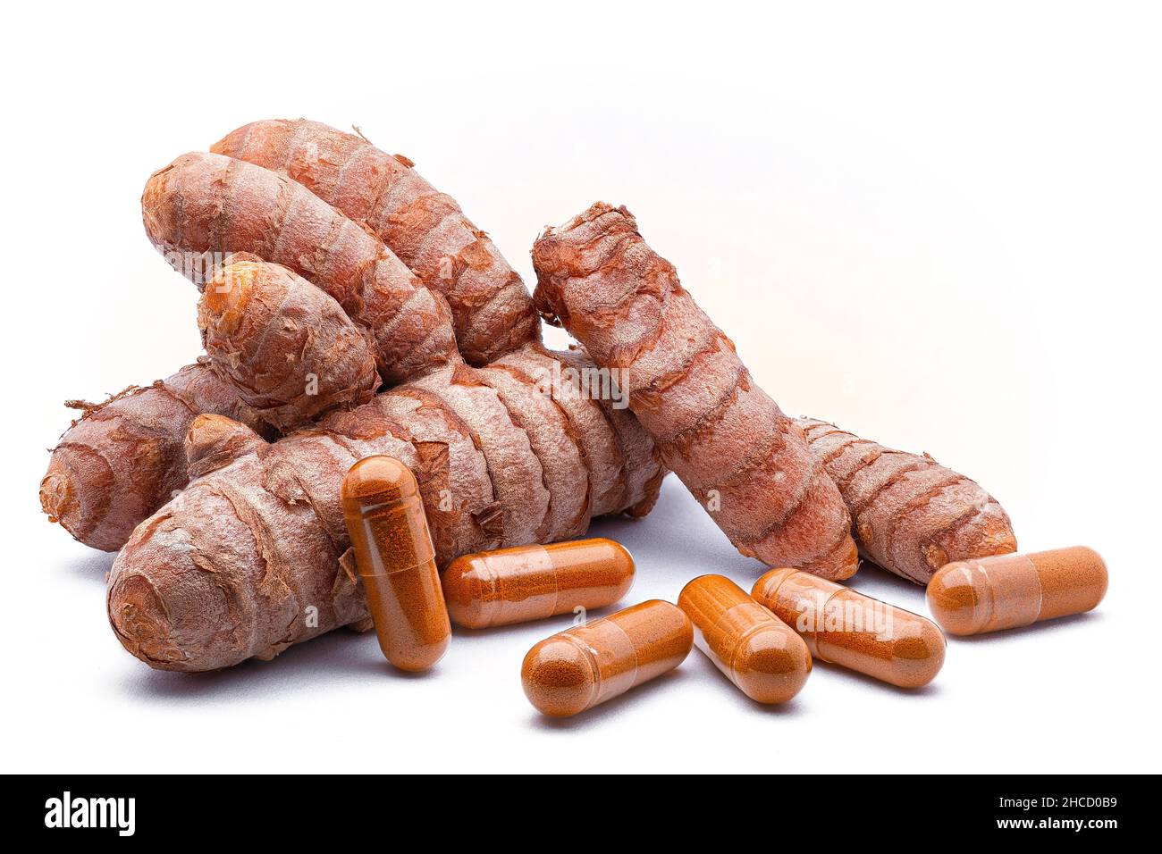 turmeric capsule, curcuma powder and tumeric rhizome,(Curcuma longa ...
