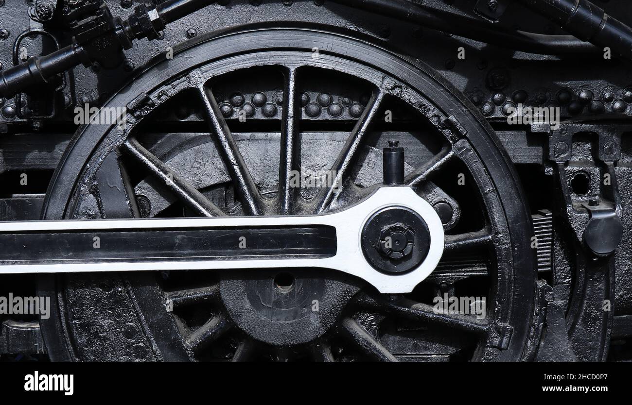 Grayscale shot of an old steam locomotive wheel Stock Photo - Alamy