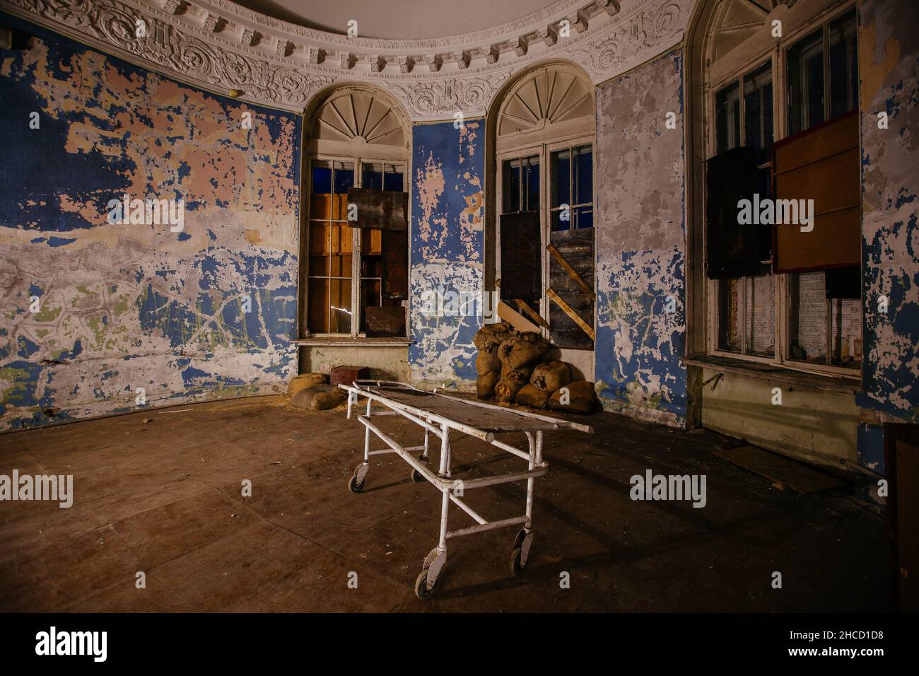 Inside of dark old creepy abandoned hospital at night Stock Photo - Alamy