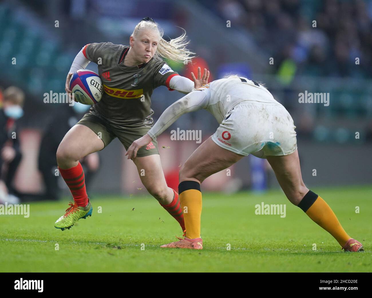 Harlequins' Heather Cowell hands off Wasps' Corys Williams during the ...
