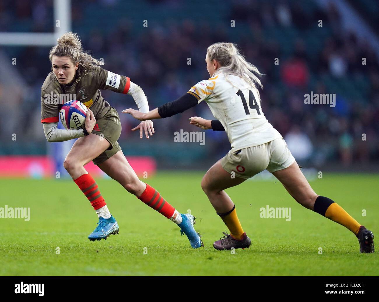 Harlequins' Ellie Kildunne gets away from Wasps' Ellie Boatman during ...