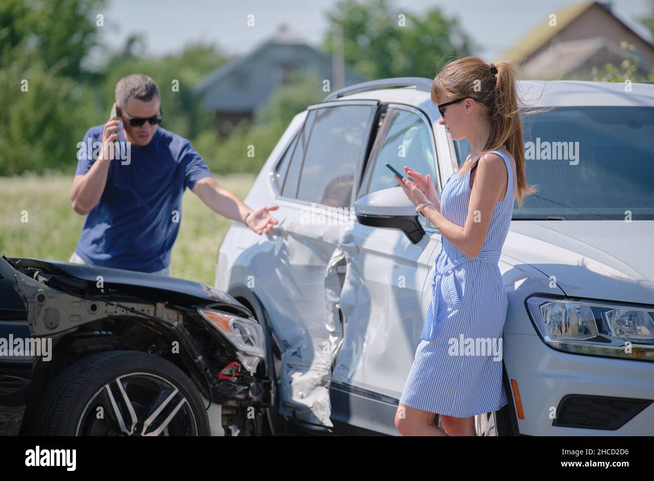 Drivers of smashed vehicles talking on cellphone calling for help in ...