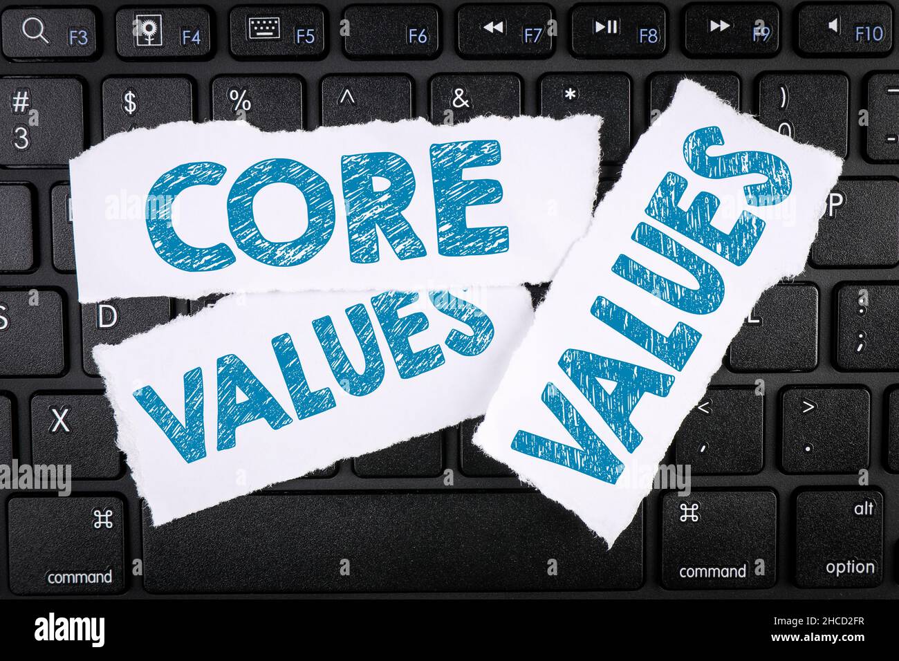 The word value on black keyboard with blue key Stock Photo - Alamy