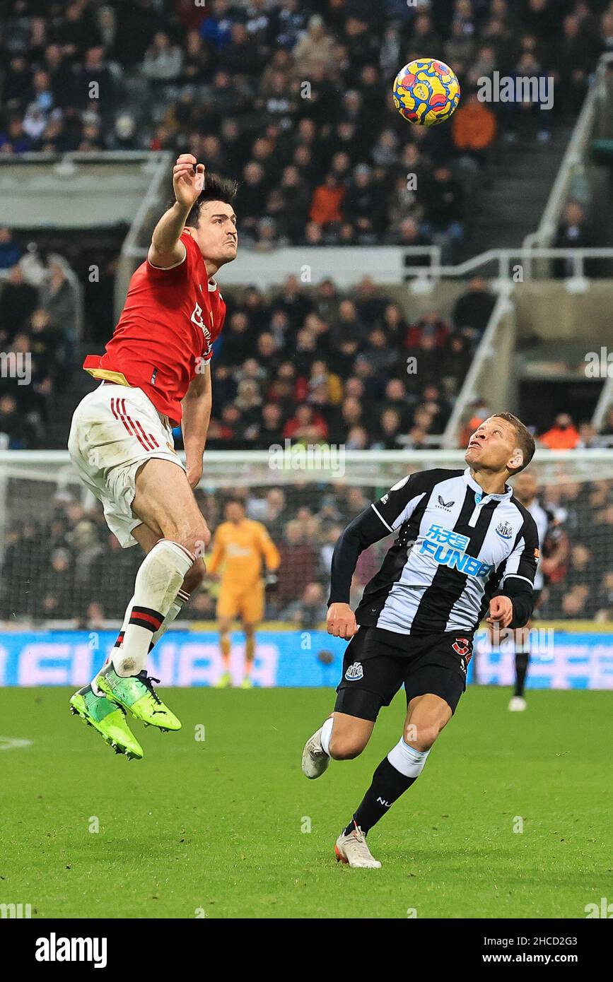 Harry Maguire #5 of Manchester United heads the ball clear Stock Photo ...