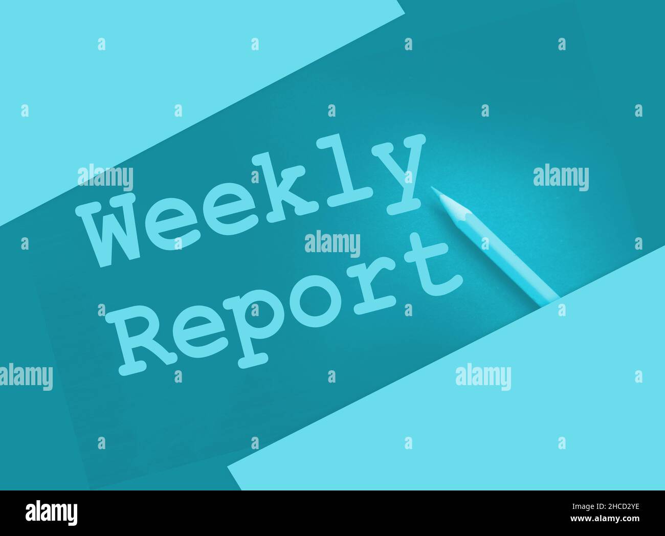 Weekly Report words printed in yellow on black with yellow pencil ...