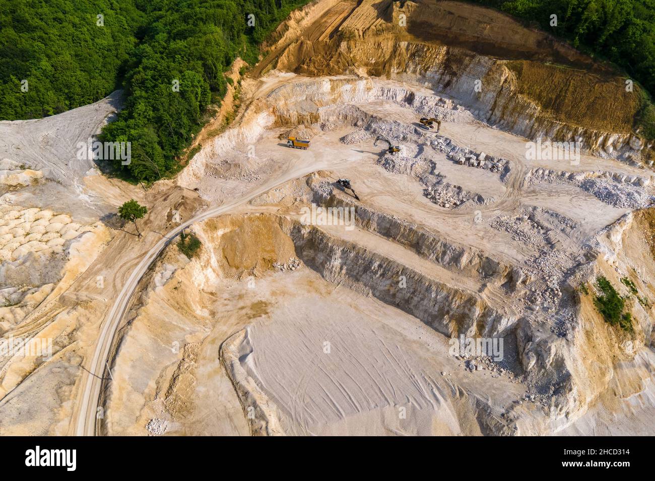 Open pit mining of construction sand stone materials with excavators ...