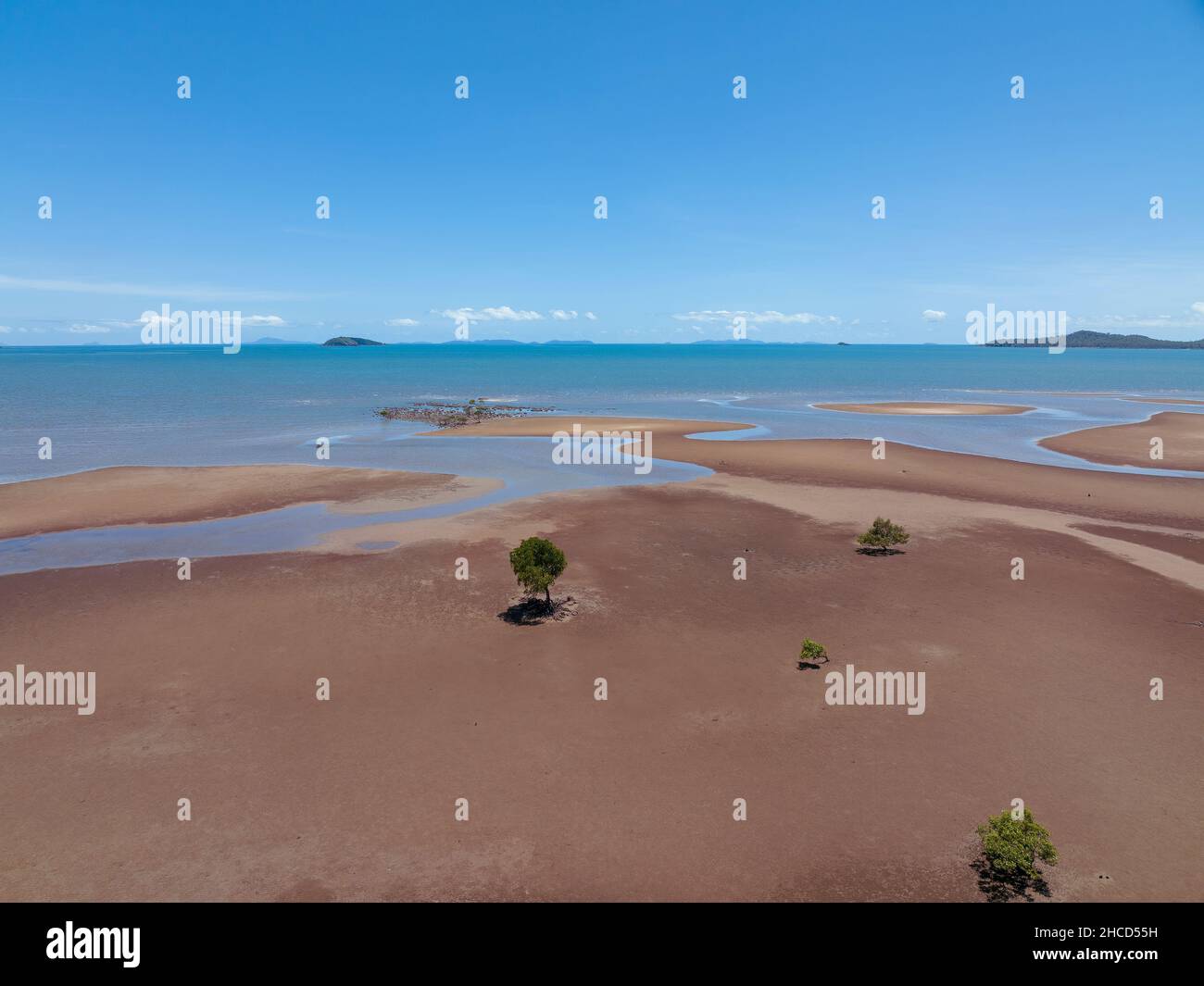 Aerial flight over tidal sands towards the blue ocean Stock Photo - Alamy
