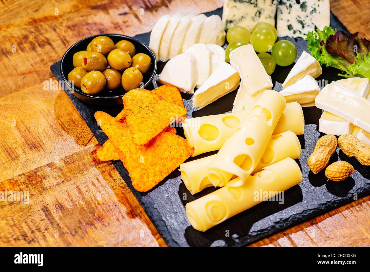 Various types of cheese with empty space background.Set or assortment ...