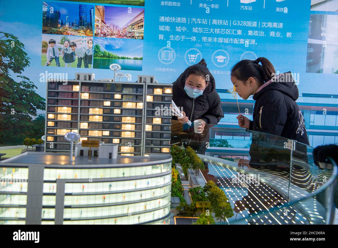 HAIAN, CHINA - DECEMBER 11, 2021 - Residents view sand tables at the ...