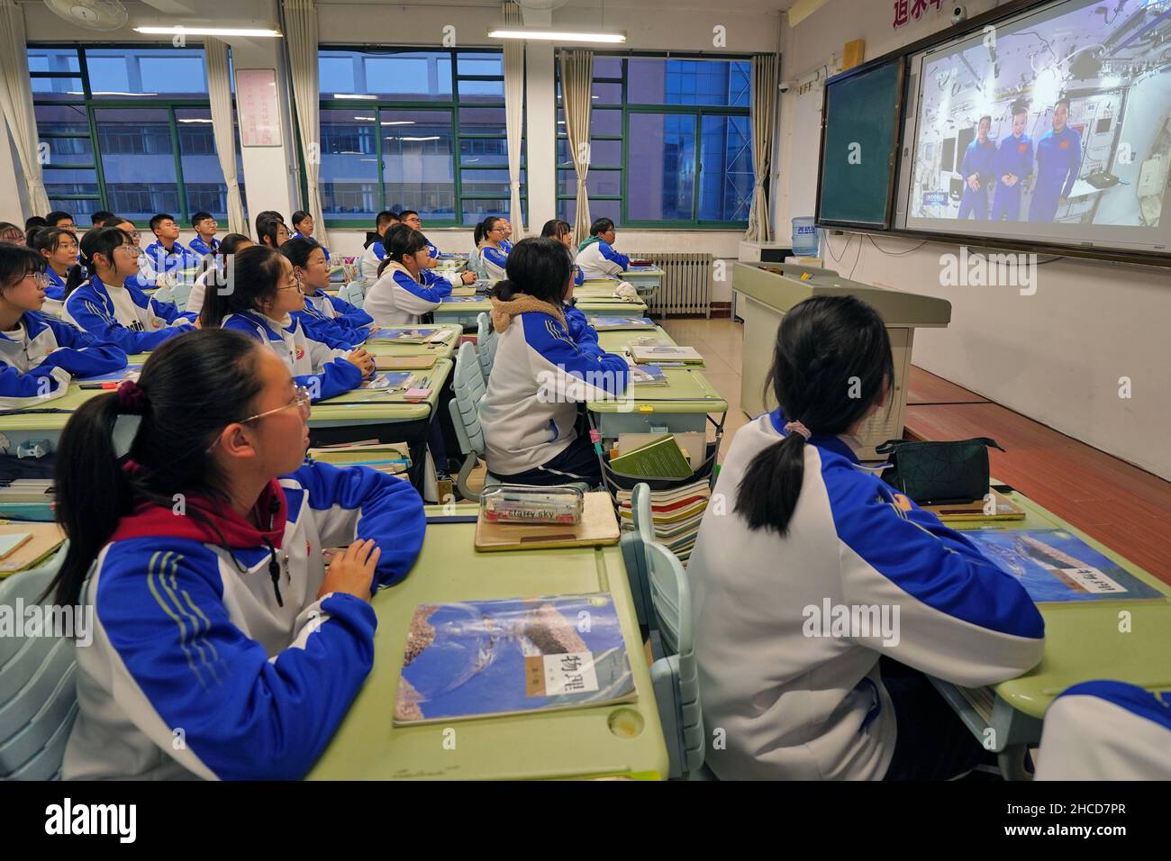 YANTAI, CHINA - DECEMBER 9, 2021 - Students watch the Tiangong Class at ...
