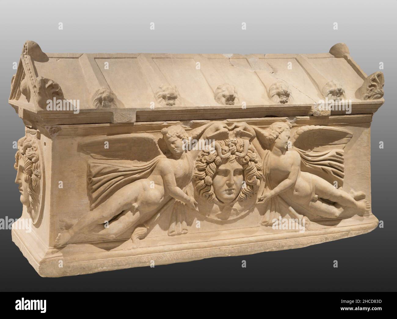 Ancient roman sarcophagus with reliefs of the head of Medusa's gorgon ...