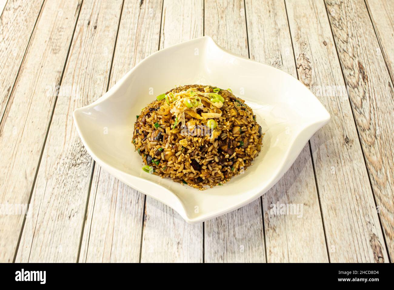 Arroz chaufa, or arroz de chaufa, is a fried rice-based dish consumed ...