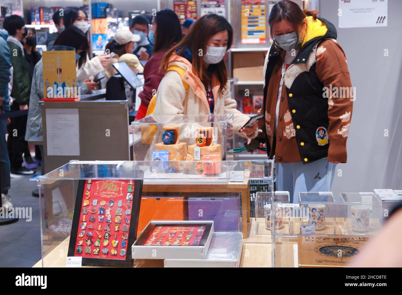 SHANGHAI, CHINA - DECEMBER 5, 2021 - Customers select comic strip ...