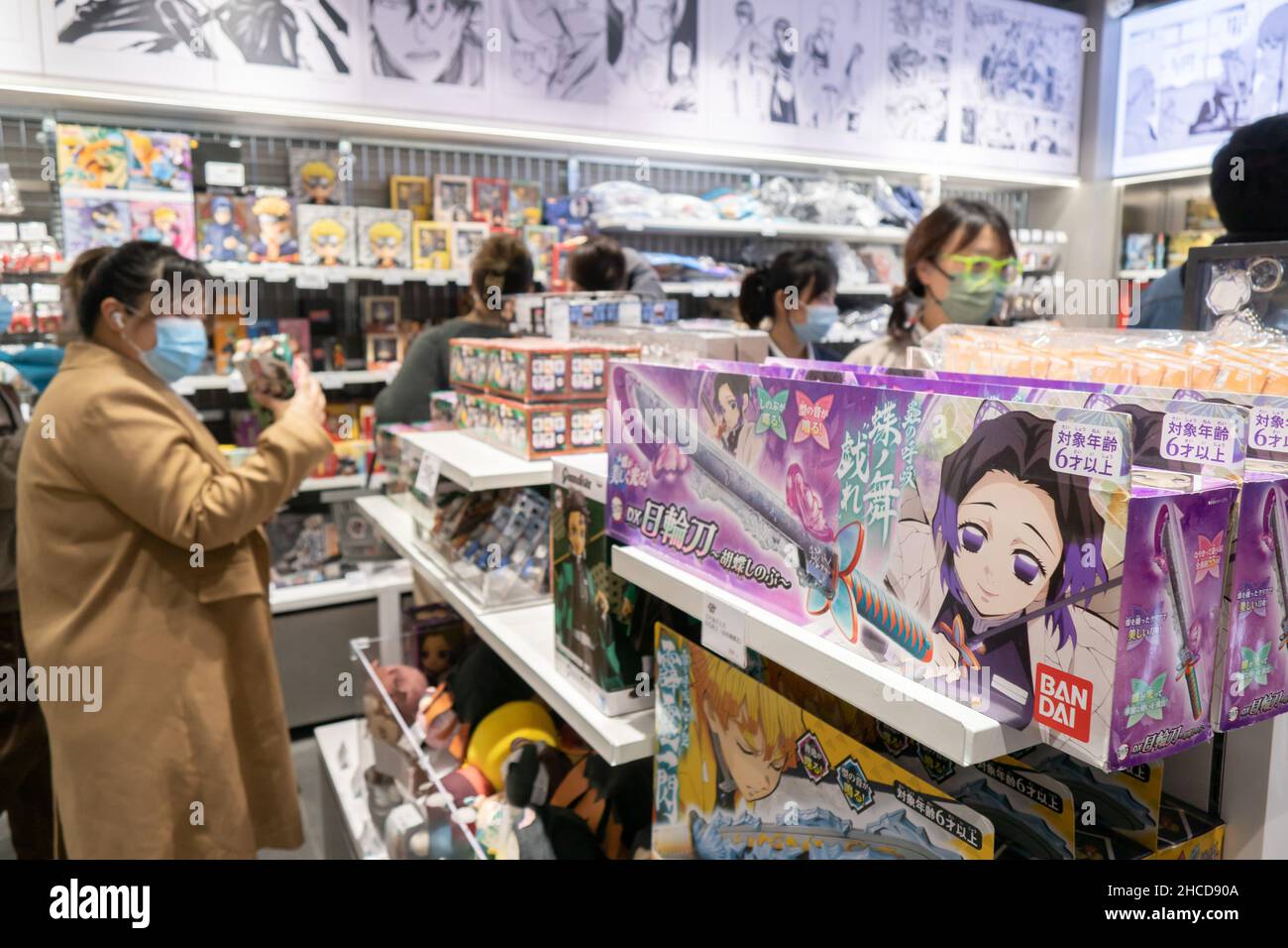 SHANGHAI, CHINA - DECEMBER 7, 2021 - Customers select comic strip ...